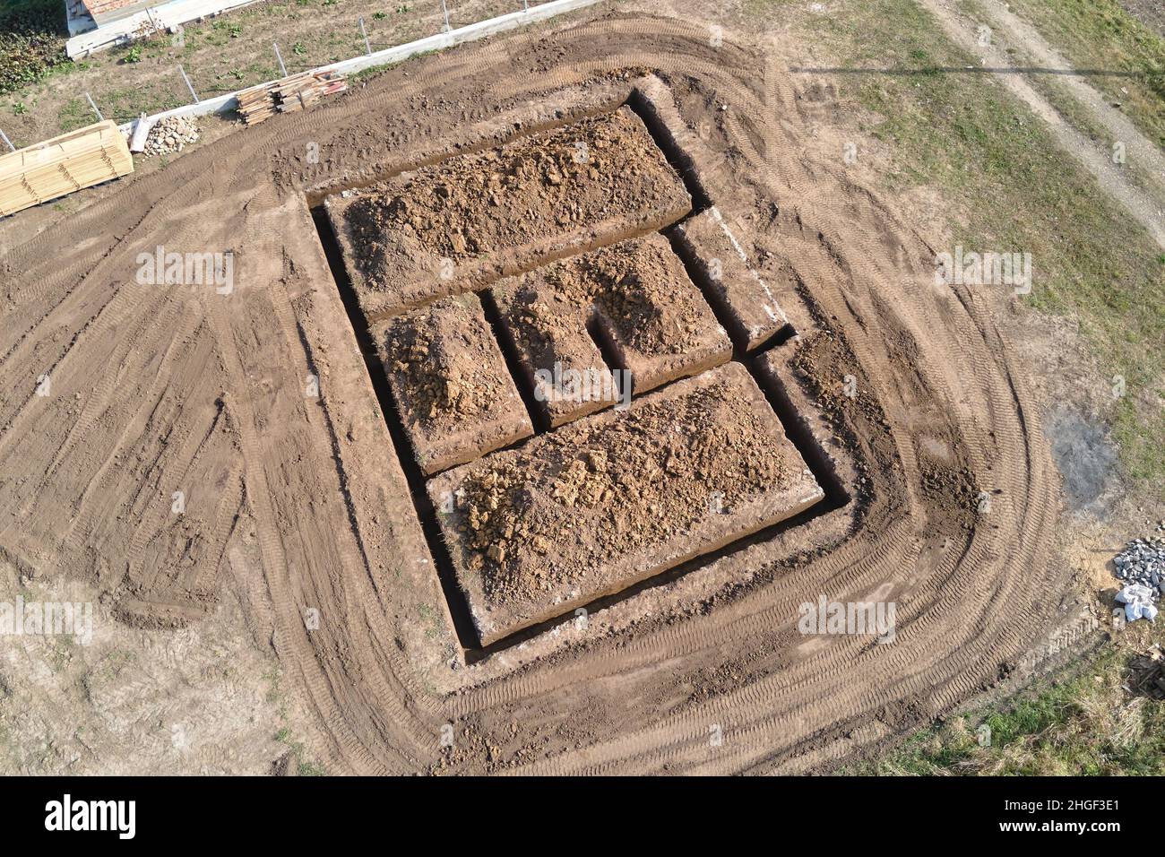 Dug out trench for building works of new house concrete foundation on ...
