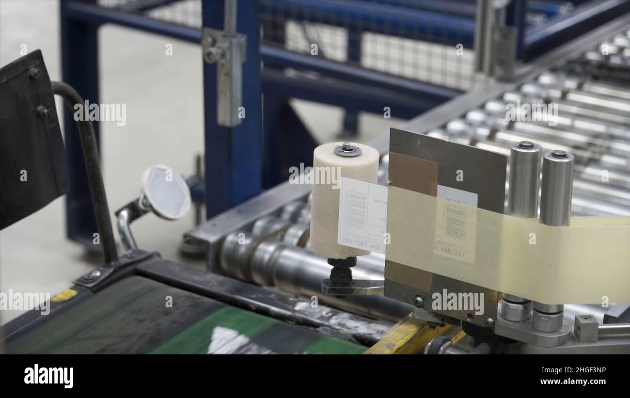 Cardboard manufacture machine propduct line making boxes. Clip. Packed ...