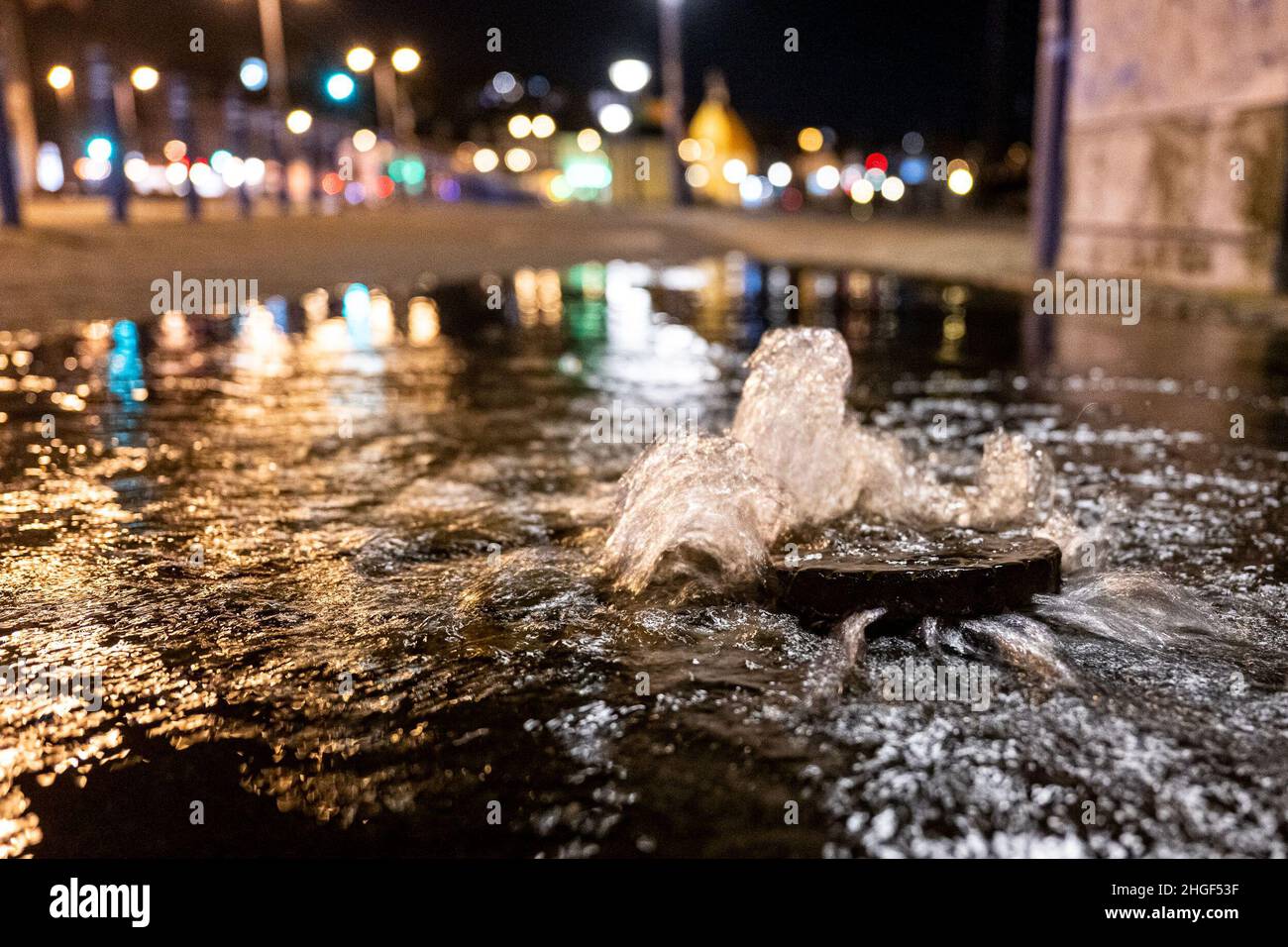 Water flooding manhole hi-res stock photography and images - Alamy