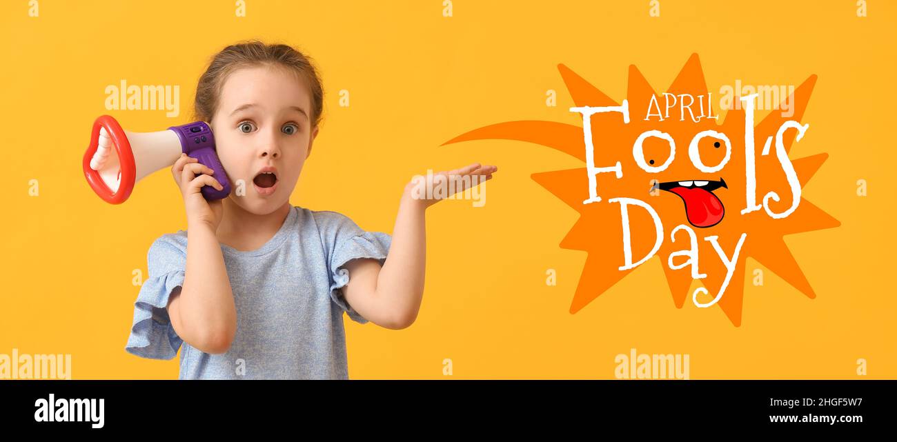 Shocked little girl with funny megaphone on color background. April ...