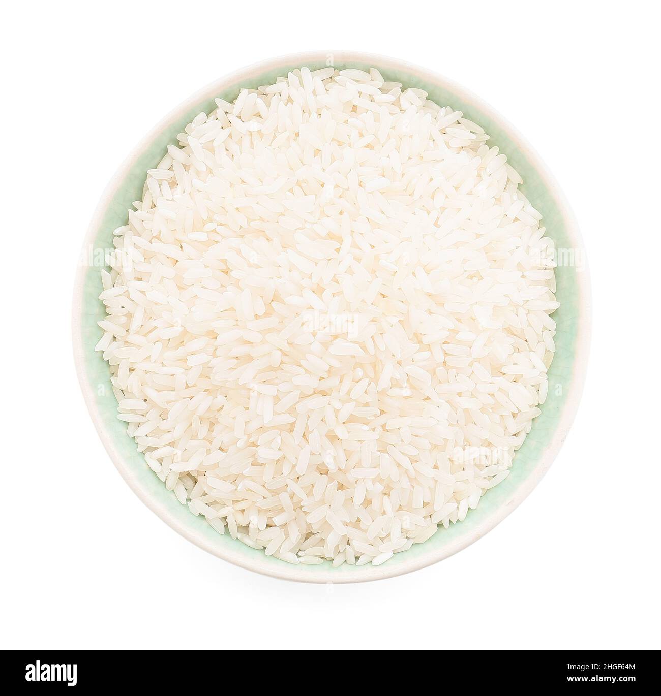 Bowl of raw rice isolated on white Stock Photo - Alamy