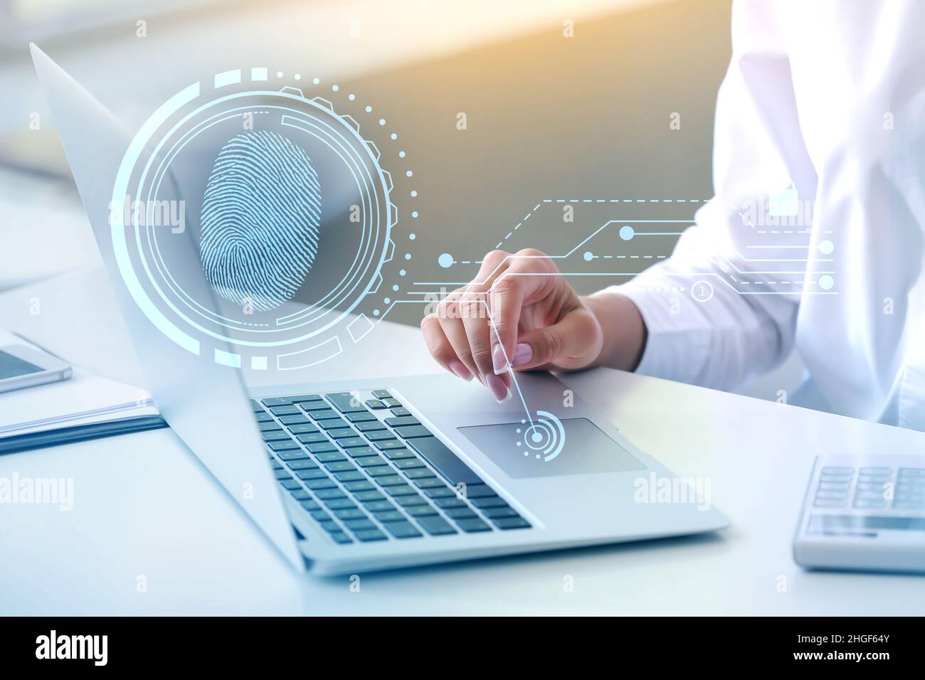 Young businesswoman logging into electronic personal account in office ...