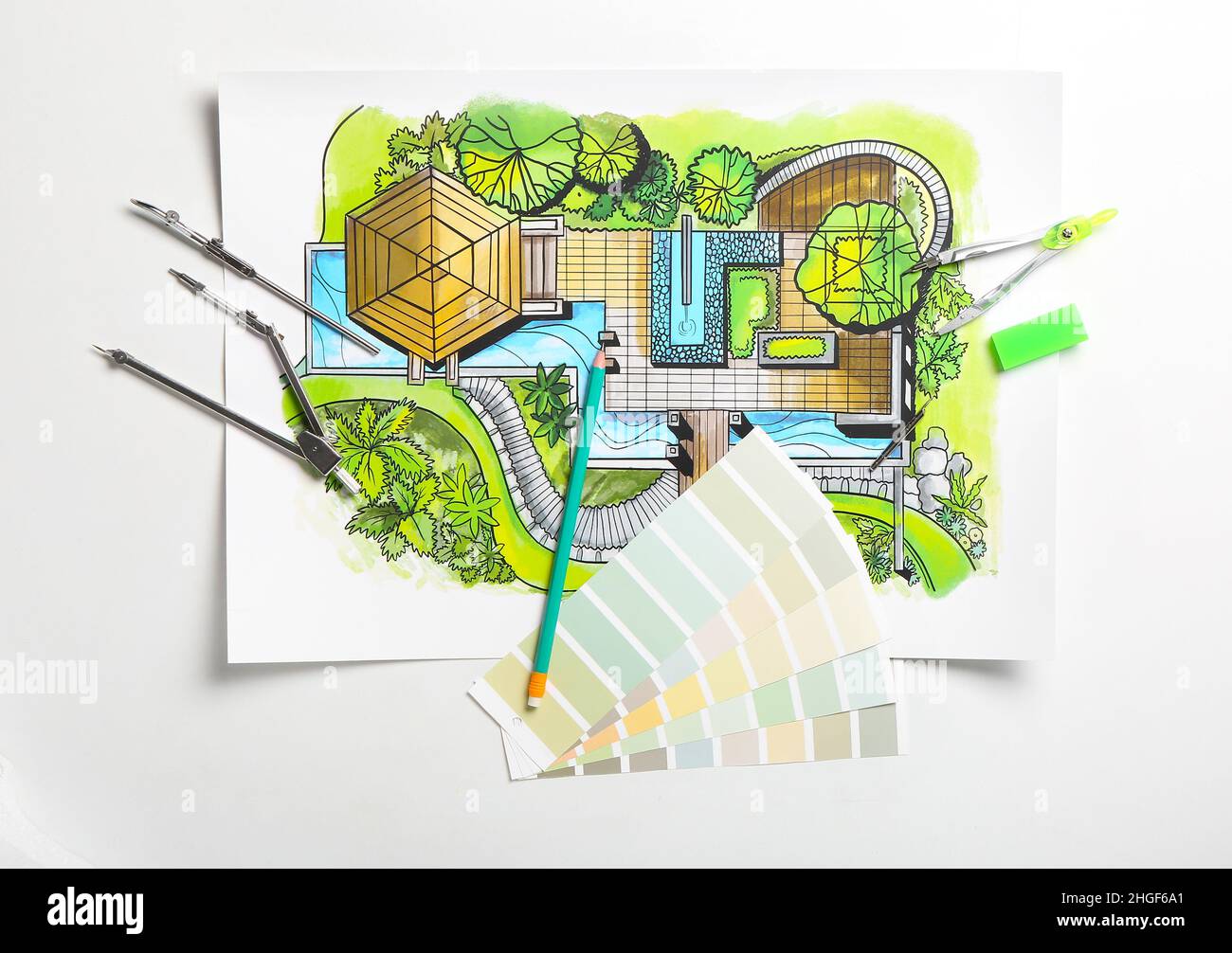Plan of landscape designer with stationery and paint palettes on white ...