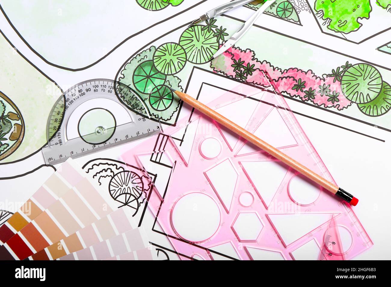 Stationery with paint palettes on plan of landscape designer Stock ...