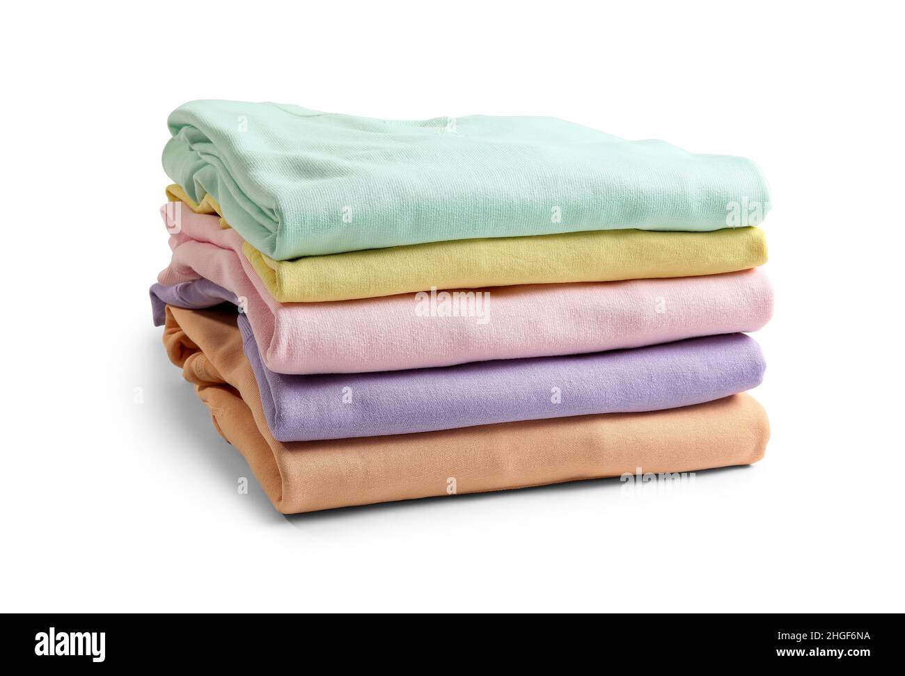 Stack of colorful clothes on white background Stock Photo - Alamy