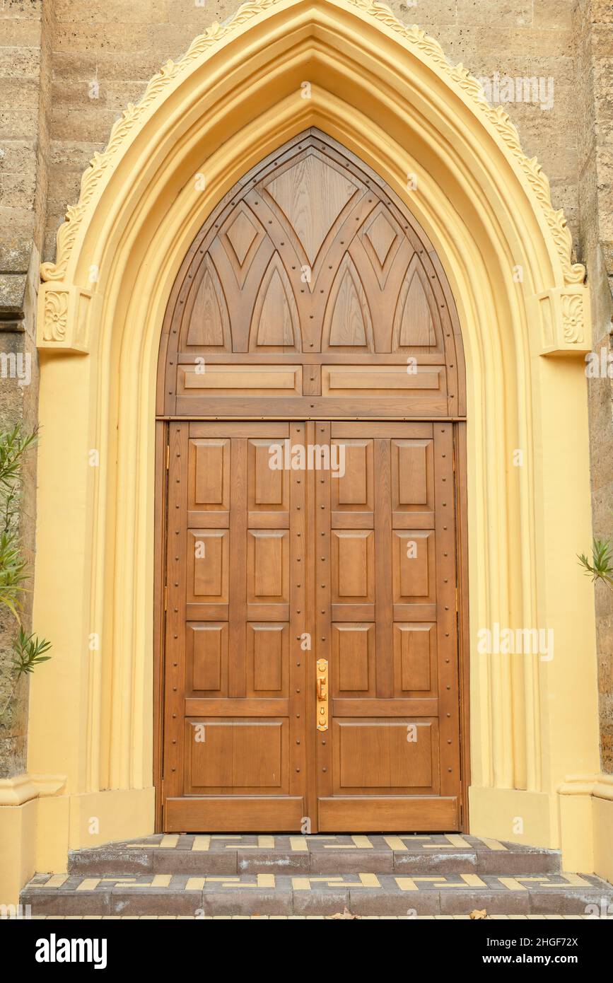 Closed doors of beautiful old building on city street Stock Photo - Alamy
