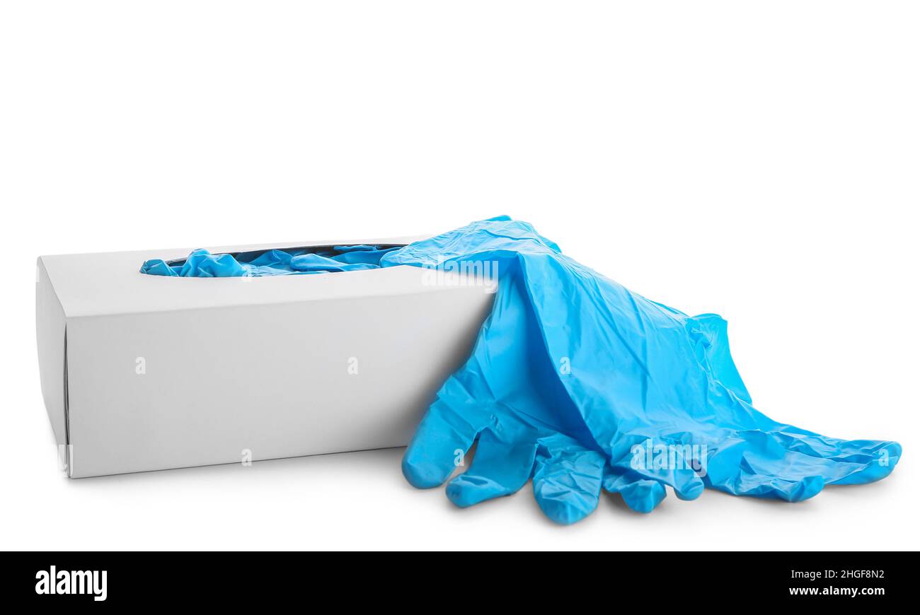 Paper box with blue medical gloves on white background Stock Photo - Alamy