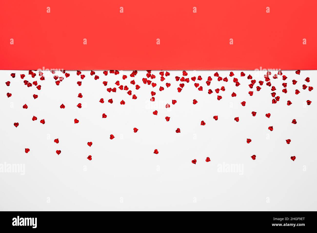 Beautiful heart shaped confetti on color background. St. Valentine's ...