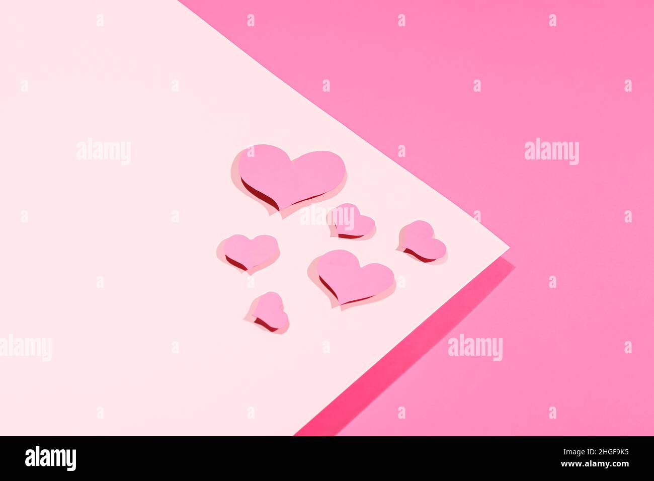 Beautiful paper hearts on color background. St. Valentine's Day Stock ...