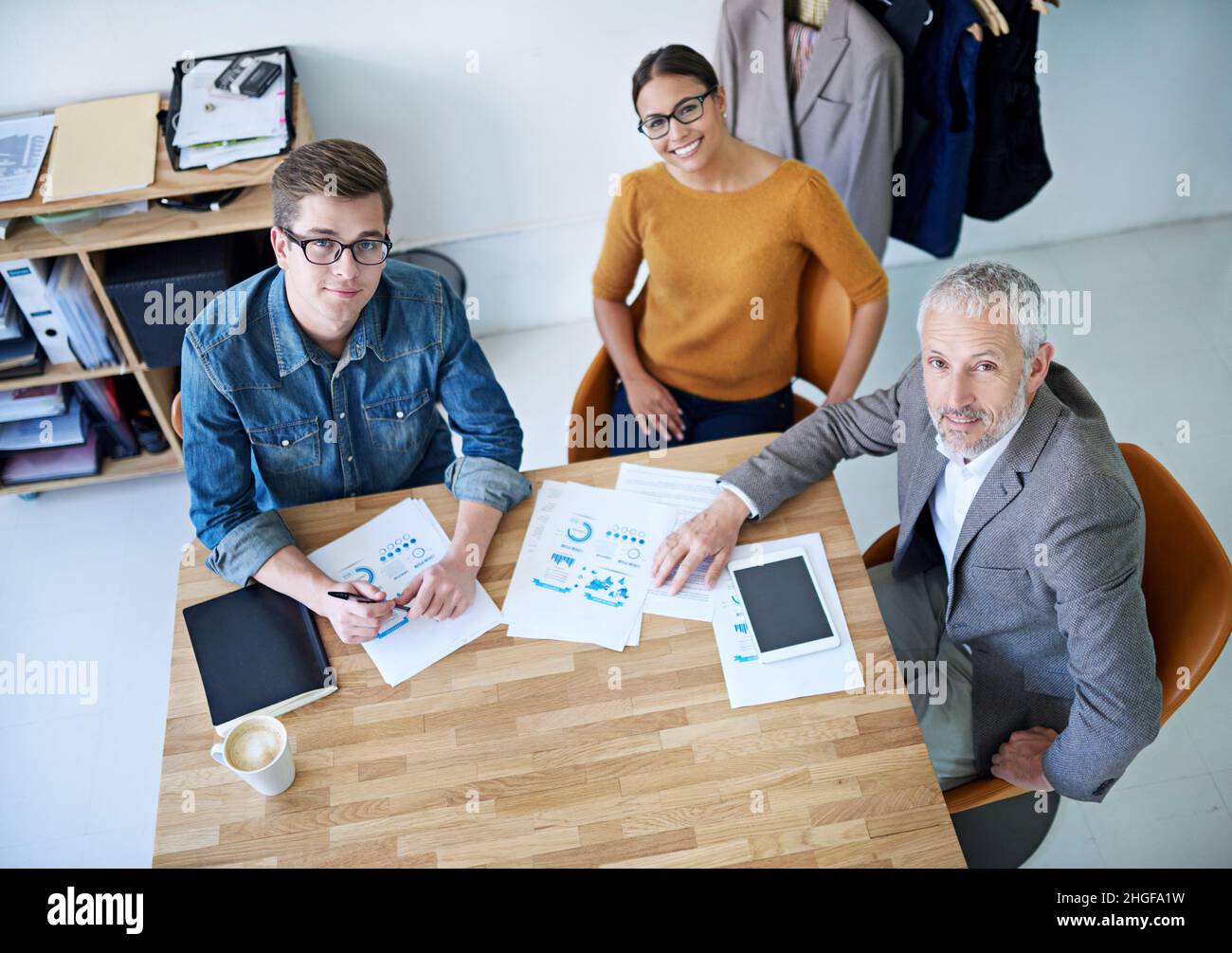 Bringing all their ideas to the table Stock Photo - Alamy