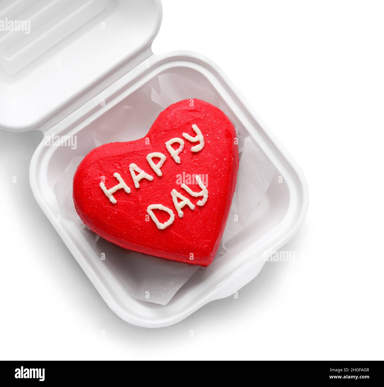 Plastic lunch box with tasty bento cake on white background Stock Photo ...