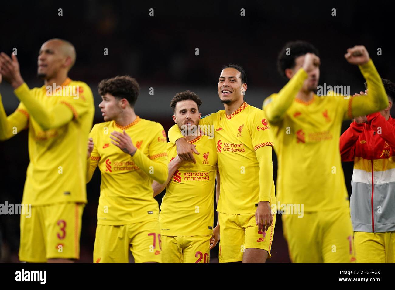 Liverpool's Diogo Jota (centre) and Virgil van Dijk react after the Carabao Cup semi final ...