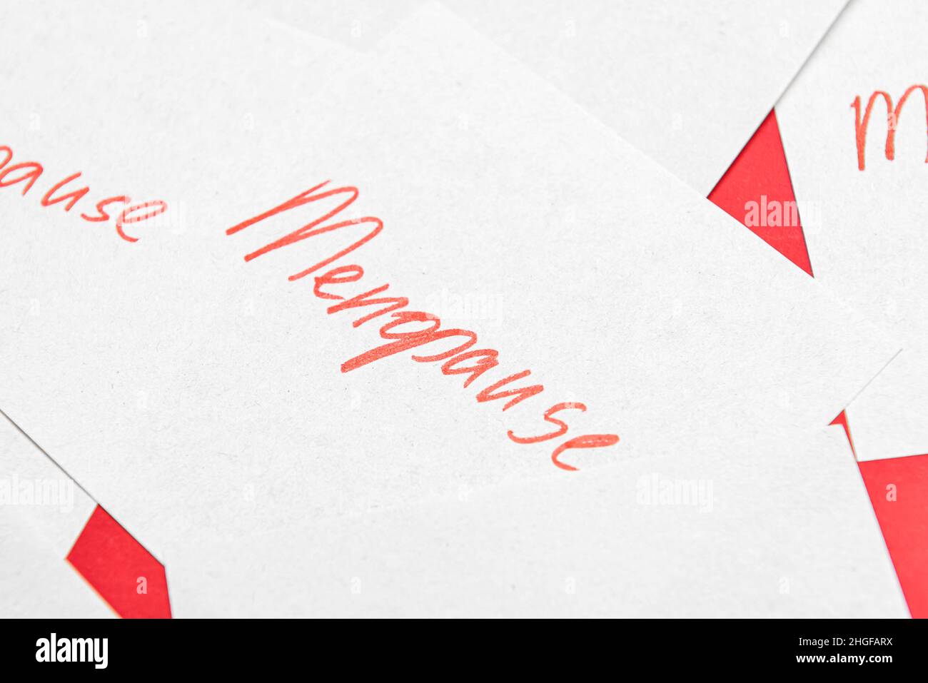 Sticky note with word MENOPAUSE on red background, closeup Stock Photo ...