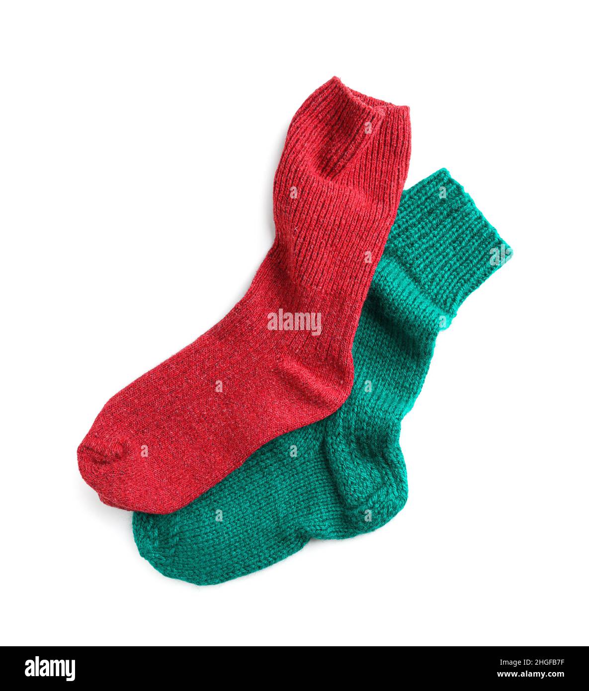 Pair of different socks isolated on white background Stock Photo - Alamy