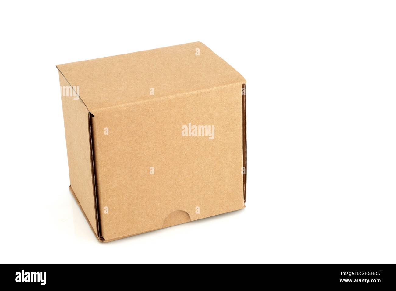 Cardboard box container cube shape brown with lid closed on white ...