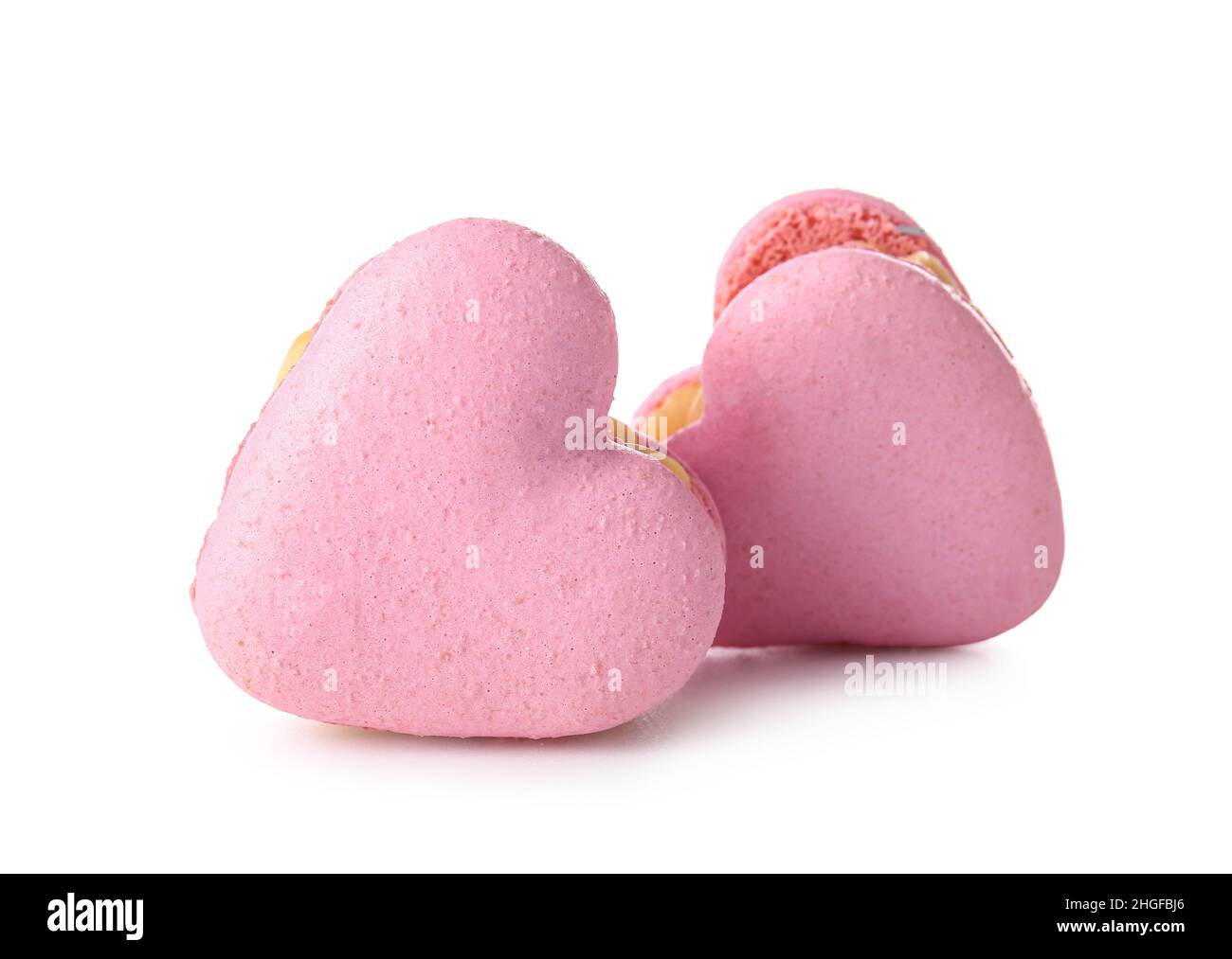 Tasty heart-shaped macaroons on white background Stock Photo - Alamy
