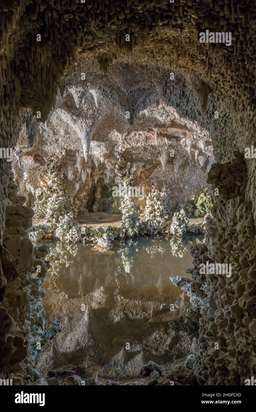 Man made grotto in the gardens of Painshill Cobham Surrey Stock Photo ...