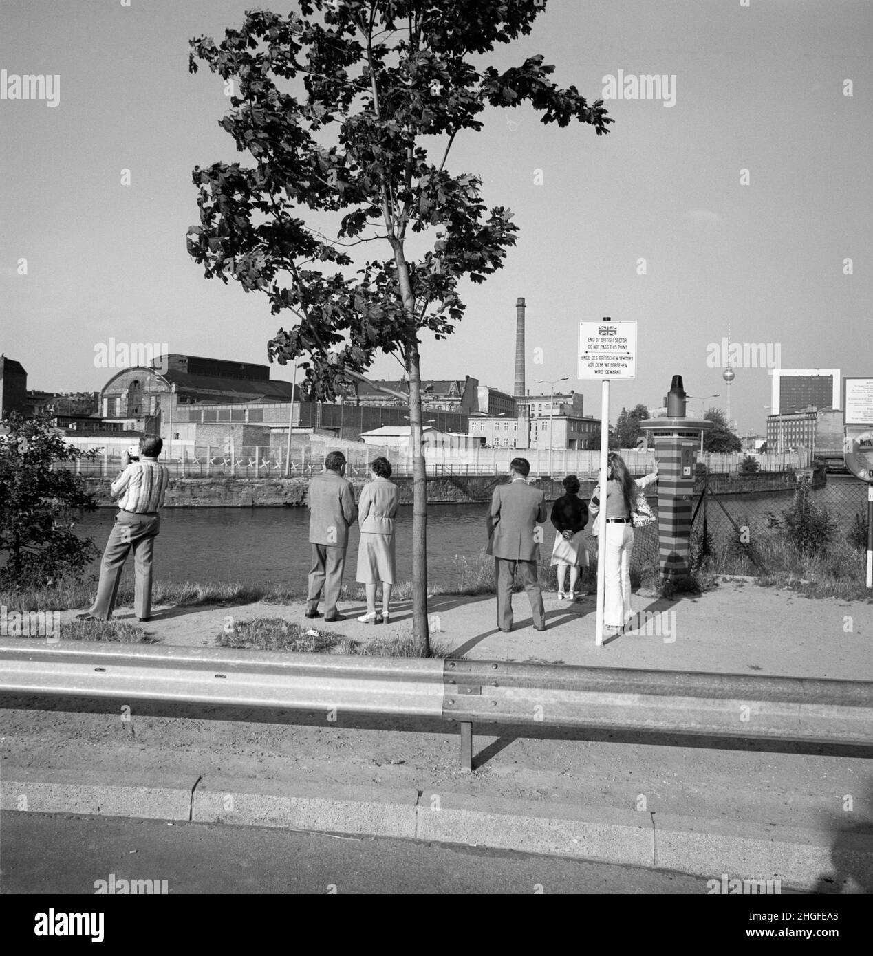 People are looking at the Berlin Wall. End of British sector. Berlin ...