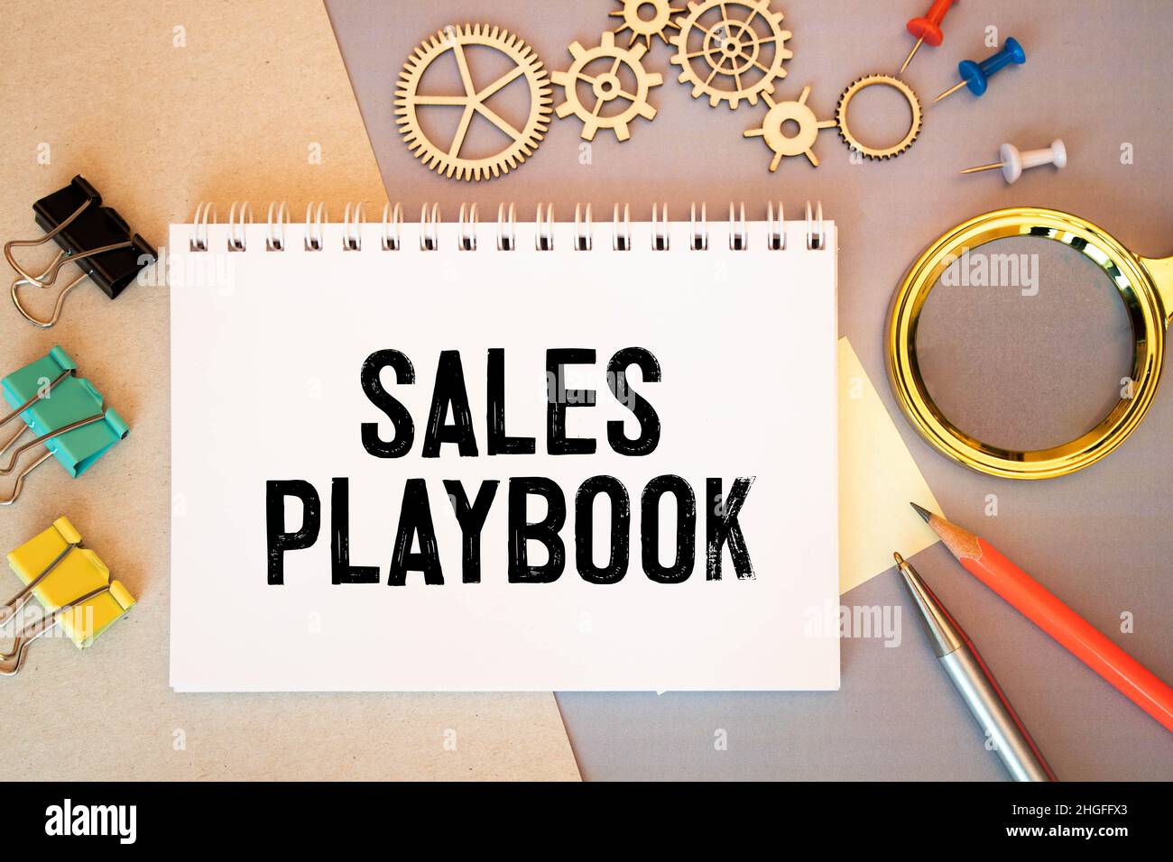 sales playbook text on paper on the chart background with pen Stock ...