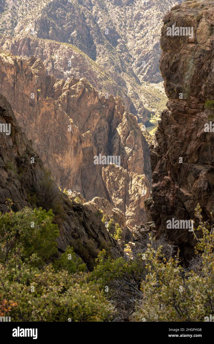 Sun Lights The Distant Wall At Warner Point Overlook in Black Canyon of ...