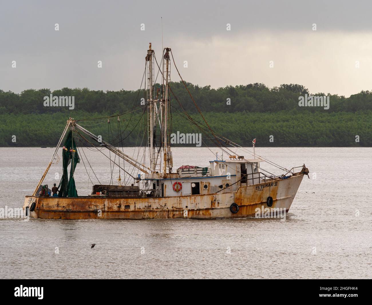 Old fishing boat at sea sailing out for another haul Stock Photo - Alamy