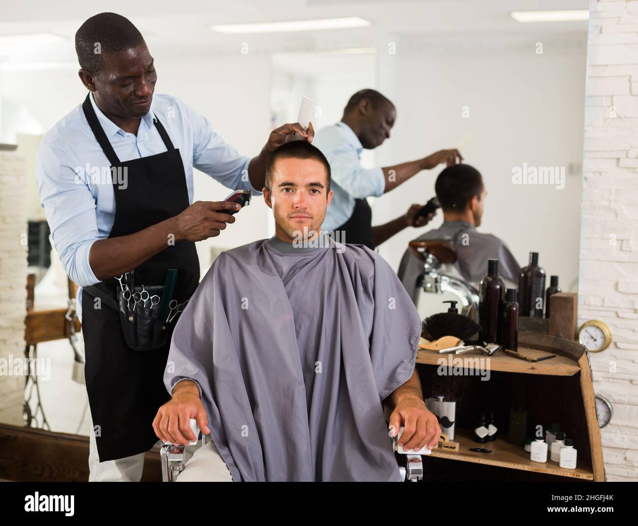 Man getting haircut from hi-res stock photography and images - Alamy