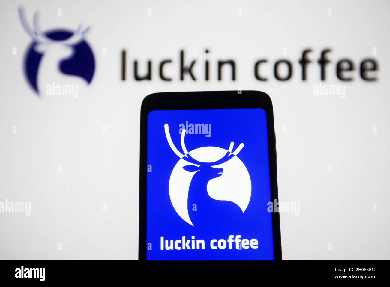In this photo illustration, a Luckin Coffee Inc. logo is seen on a ...