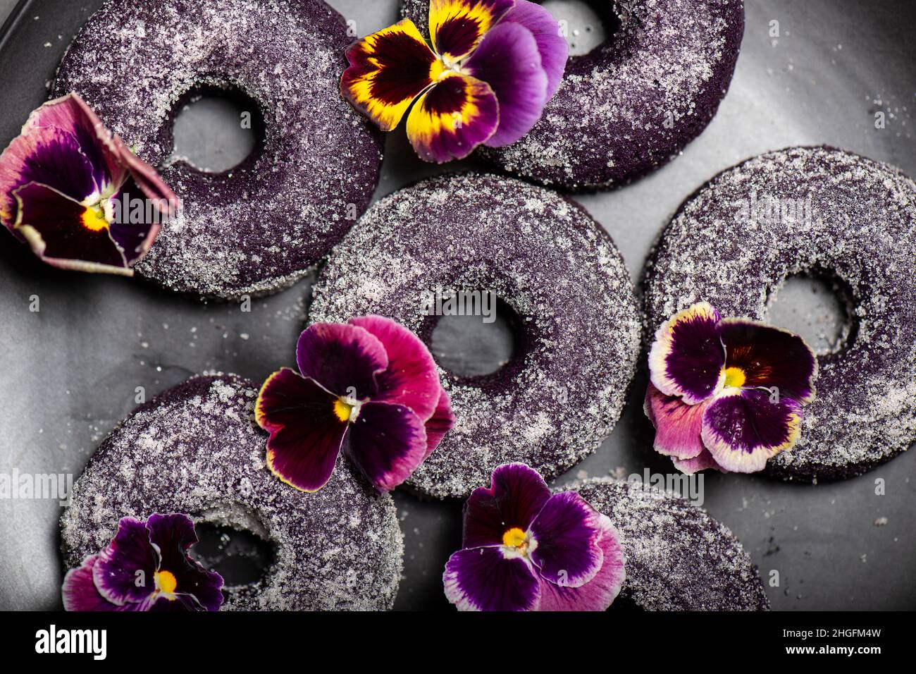 Sweet ube also known as purple yam dessert doughnut with flowers Stock ...