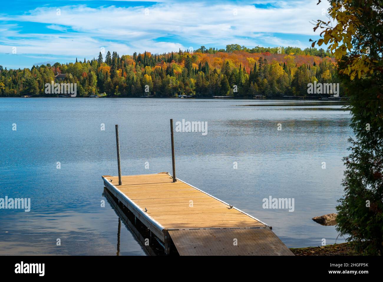 Colorful autumn foliage over Caribou Lake in northern Minnesota, with a ...