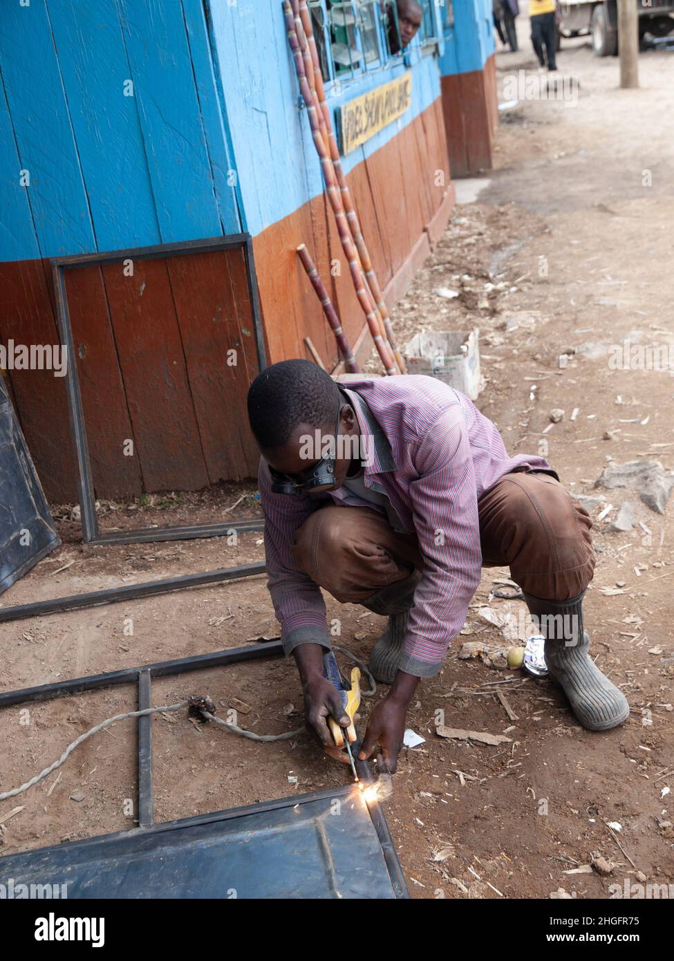 Street welding business, window frames in Kenya, Africa Stock Photo - Alamy