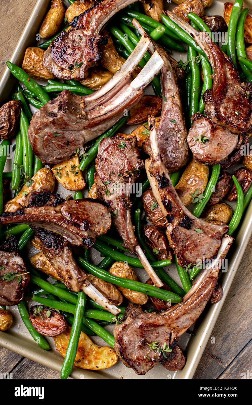 Grilled or roasted lamb chops with green beans and potatoes Stock Photo ...