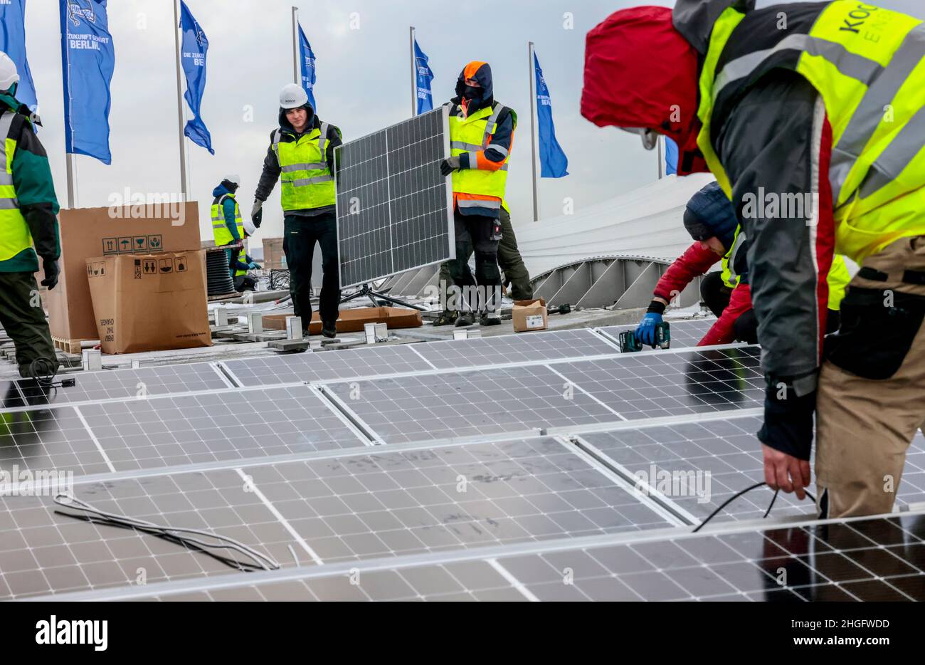Berlin, Germany. 20th Jan, 2022. Workers assemble solar modules of a ...