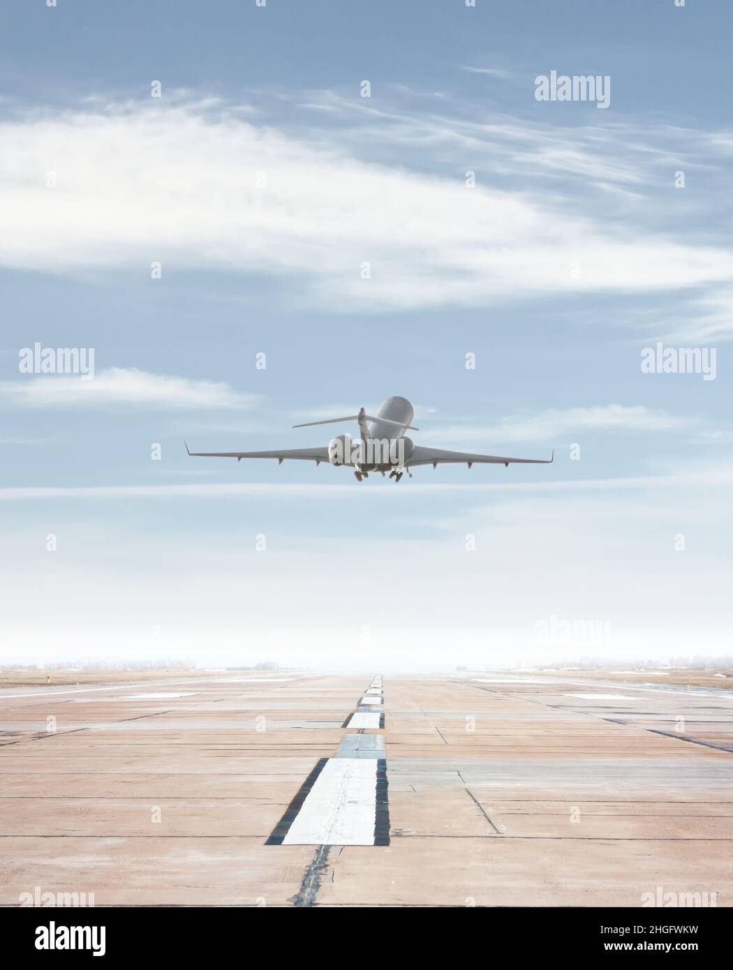 Modern executive business jet take off from airport runway Stock Photo ...