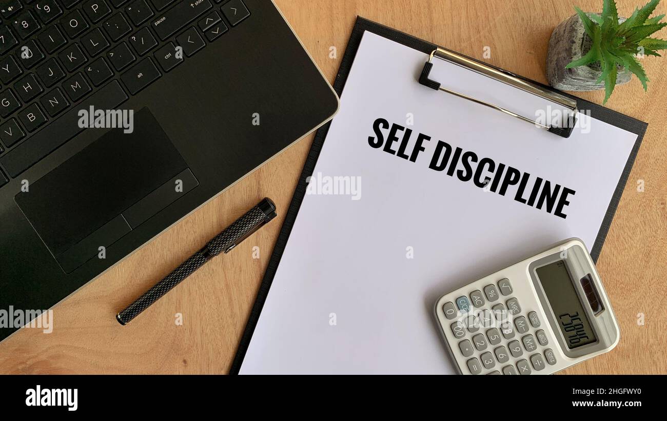 Business motivational words - Self Discipline on a piece of paper. With ...