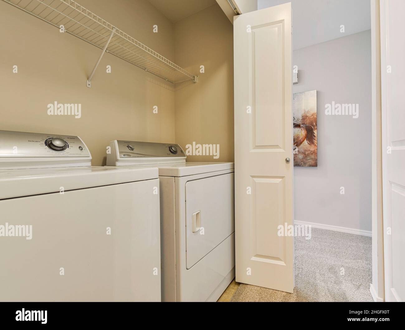 Modern residential laundry room interior Stock Photo - Alamy