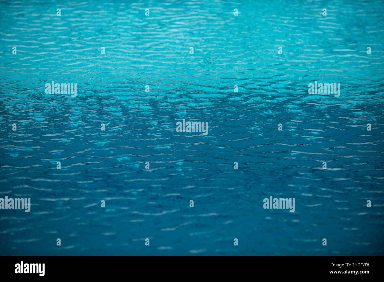 Blue ripped water in swimming pool, water pool texture and surface ...