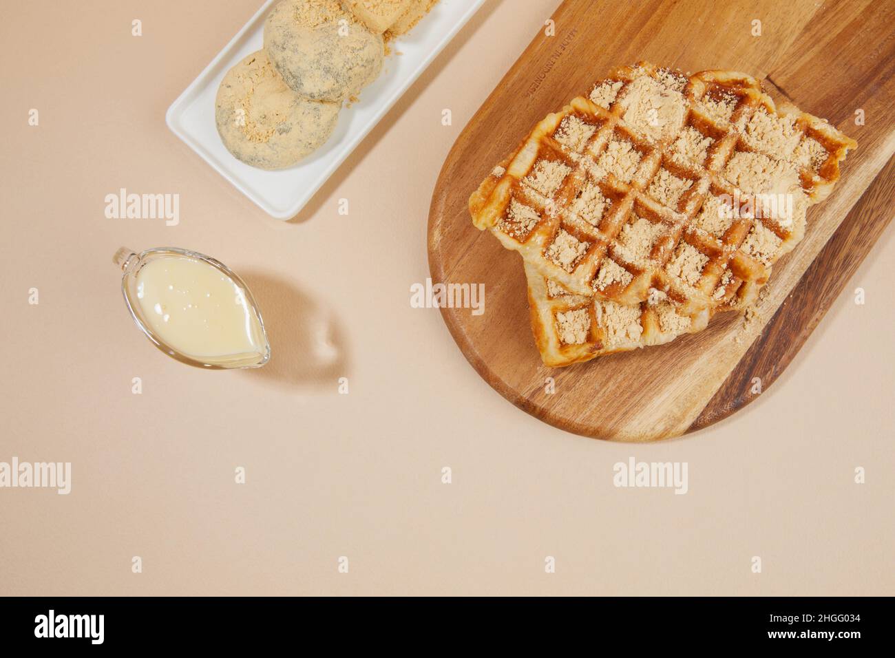 croiffle and Korean rice cake, Injeolmi Stock Photo - Alamy