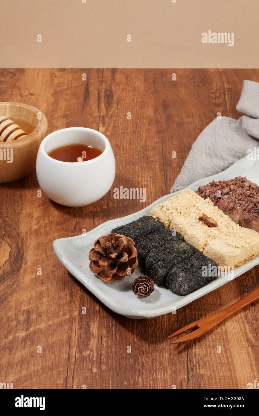 korean traditional dessert, jujube tea and Injeolmi rice cake Stock ...