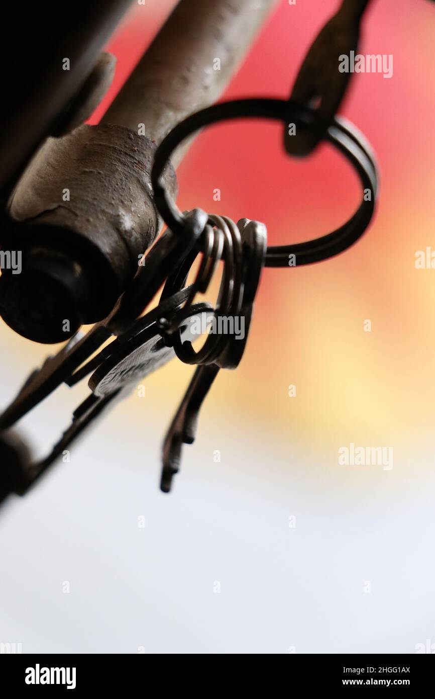 key hanging on door lock Stock Photo - Alamy