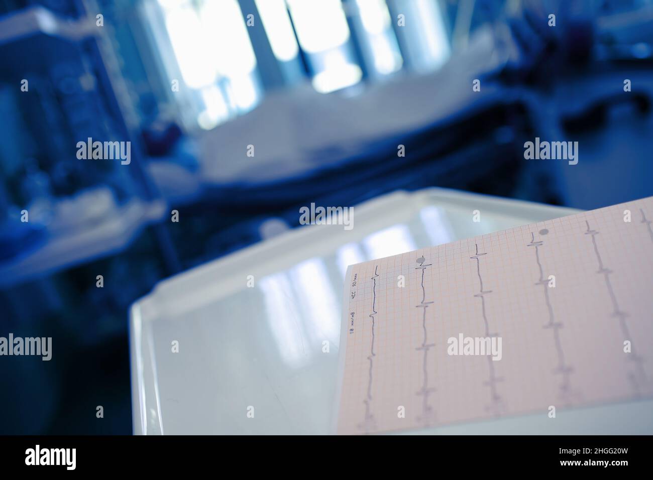 ECG chart on the desktor in the patient's room at the night Stock Photo ...