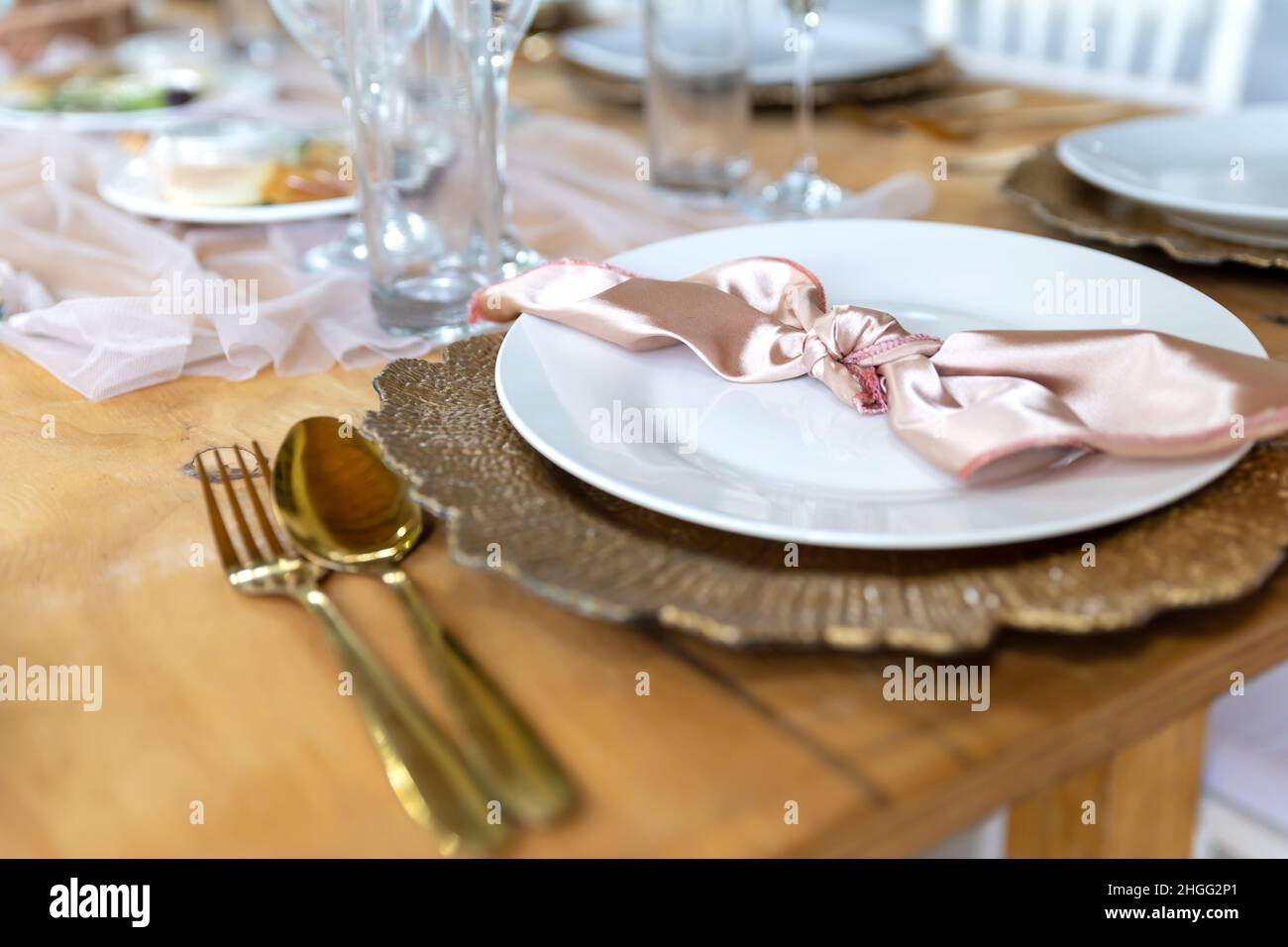 Bohemian and natural, soft pink and green table setting Stock Photo - Alamy