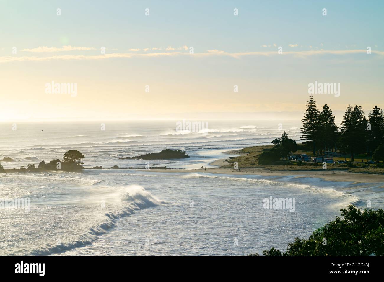 Mount maunganui main beach shrouded in sea haze caused by large surf ...
