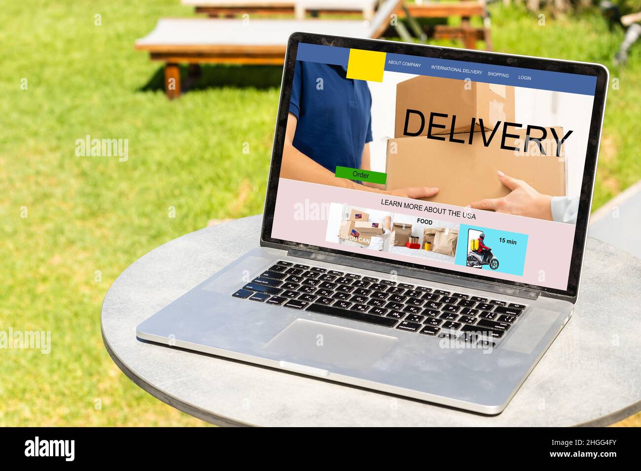 Online shopping. laptop with banner delivery Stock Photo - Alamy