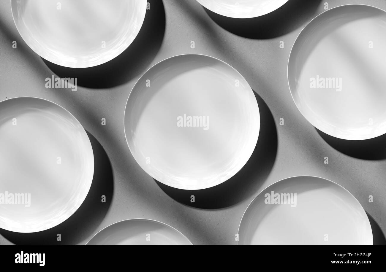 Template of a white plate isolated on a background with shadows, 3D ...