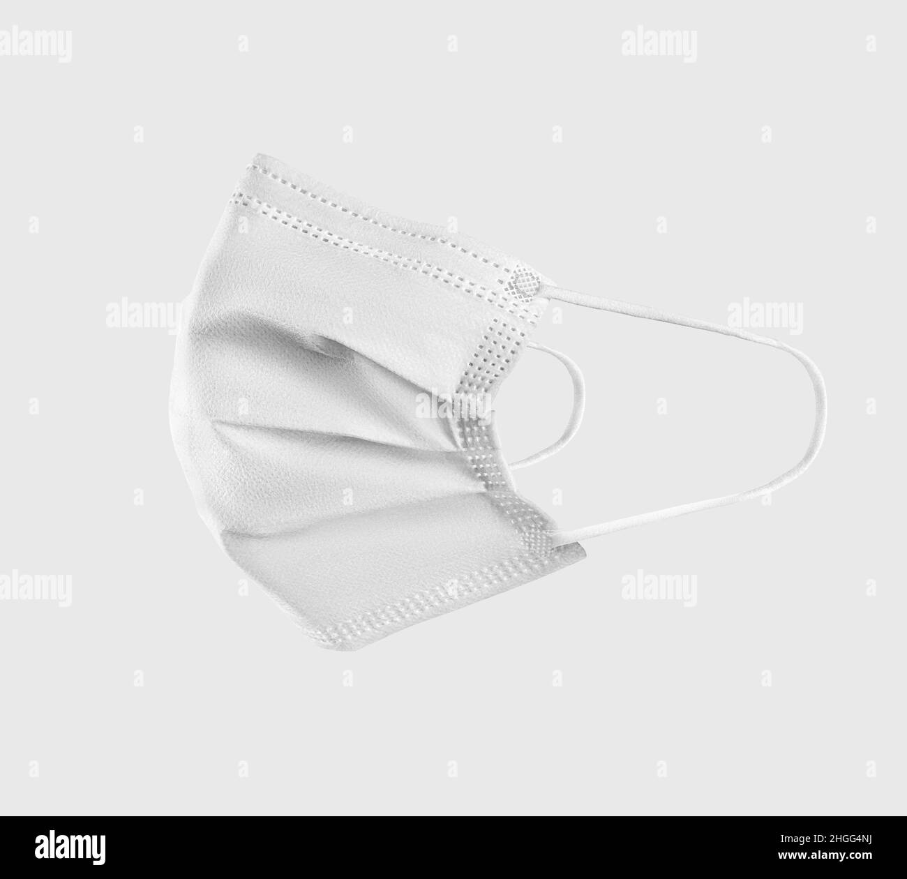 Mockup of a white surgical mask with ear loops, 3D rendering, isolated ...