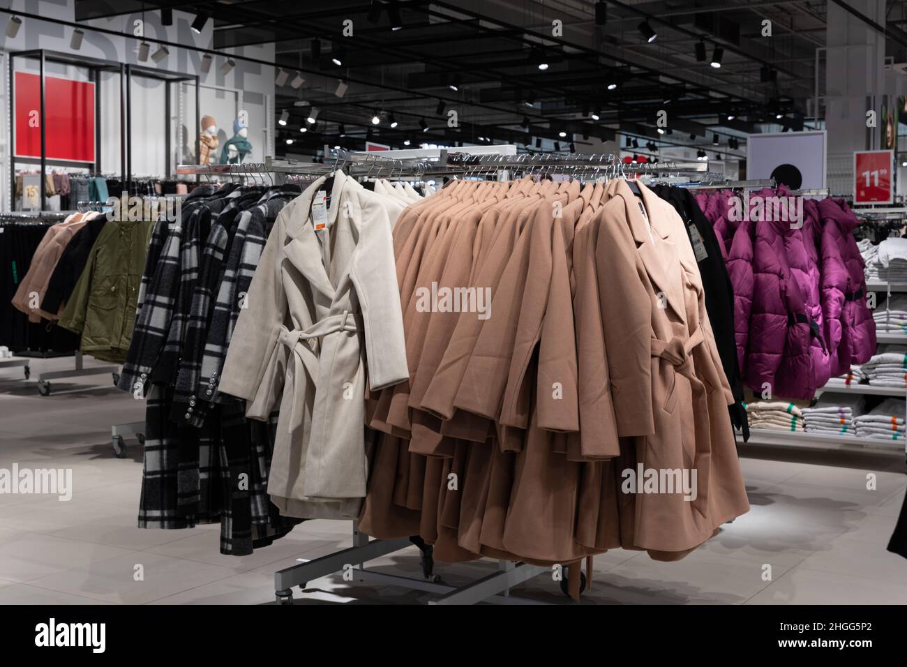 entrance group with a mannequin in a store of stylish Youth clothes ...