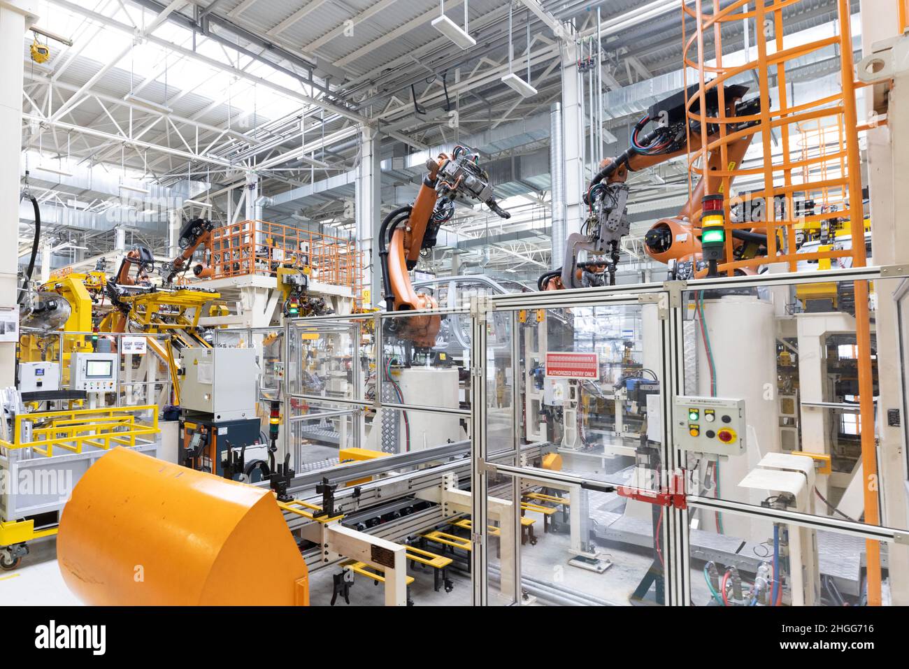 Photo of automobile production line. Welding car body. Modern car ...