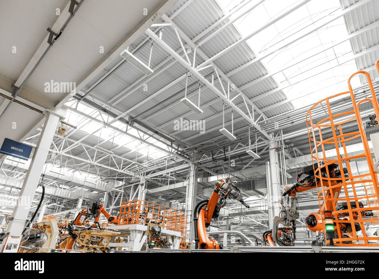 Photo of automobile production line. Welding car body. Modern car ...