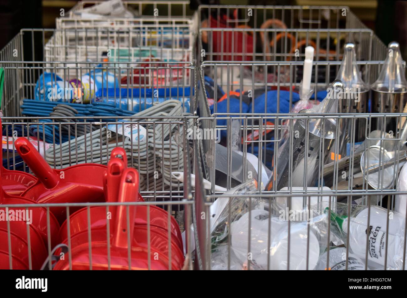 household goods in wire baskets outside shop Stock Photo - Alamy