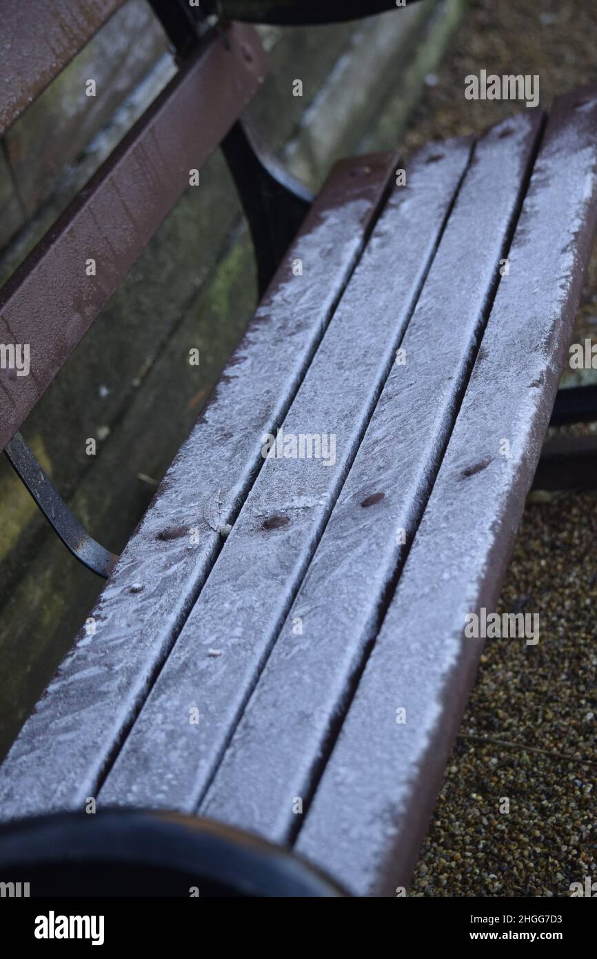 close up of wooden park bench with frost Stock Photo - Alamy